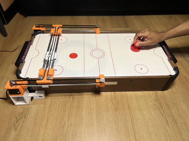 The Robot That Predicts Your Next Move and Play Air Hockey With You